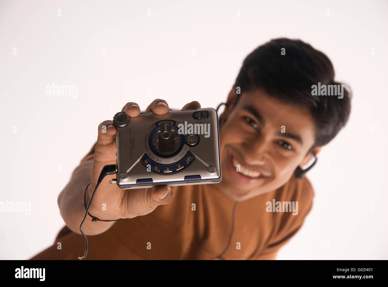 Man holding a walk man Stock Photo - Alamy