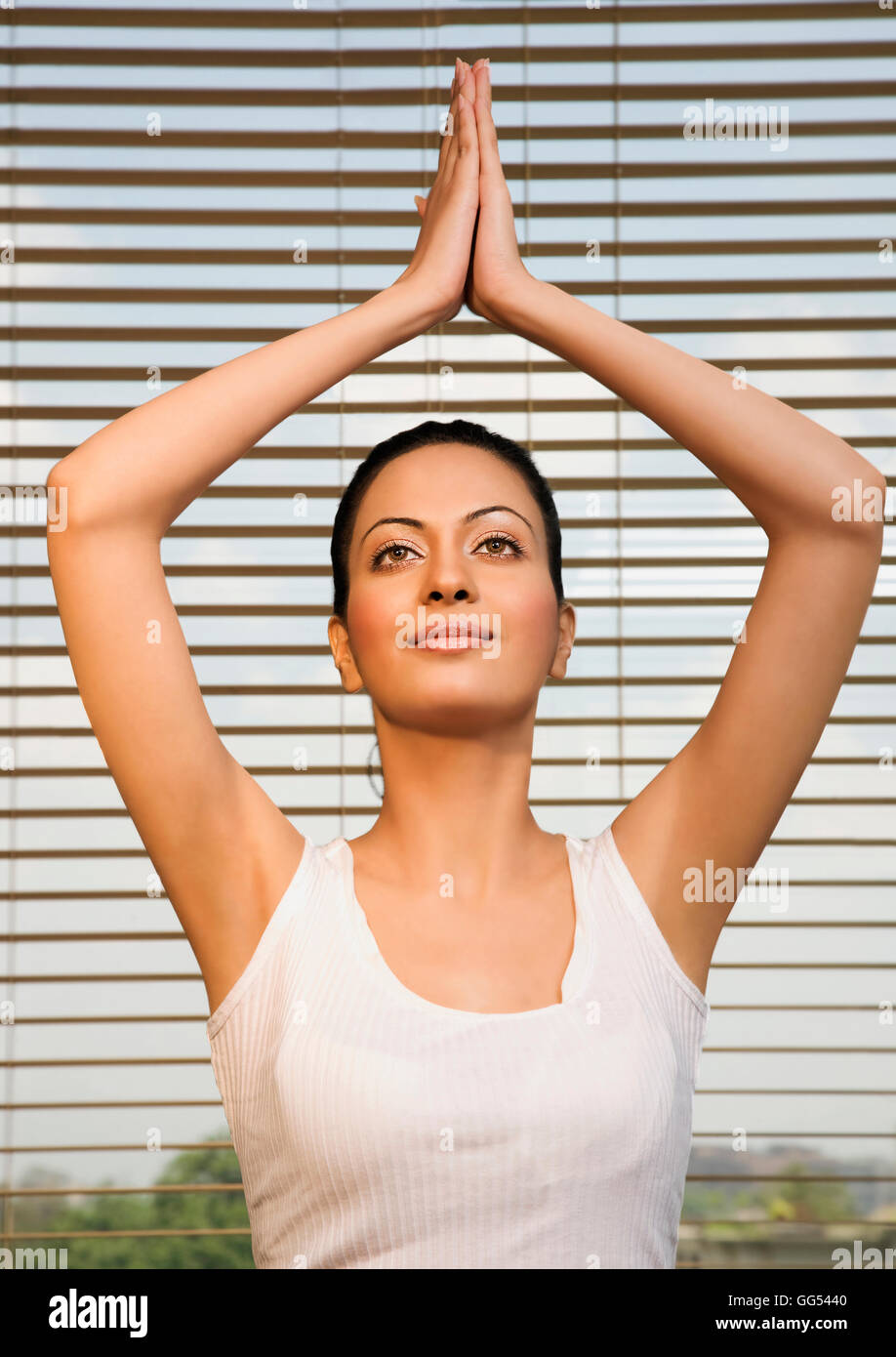 Woman practicing Yoga Stock Photo - Alamy