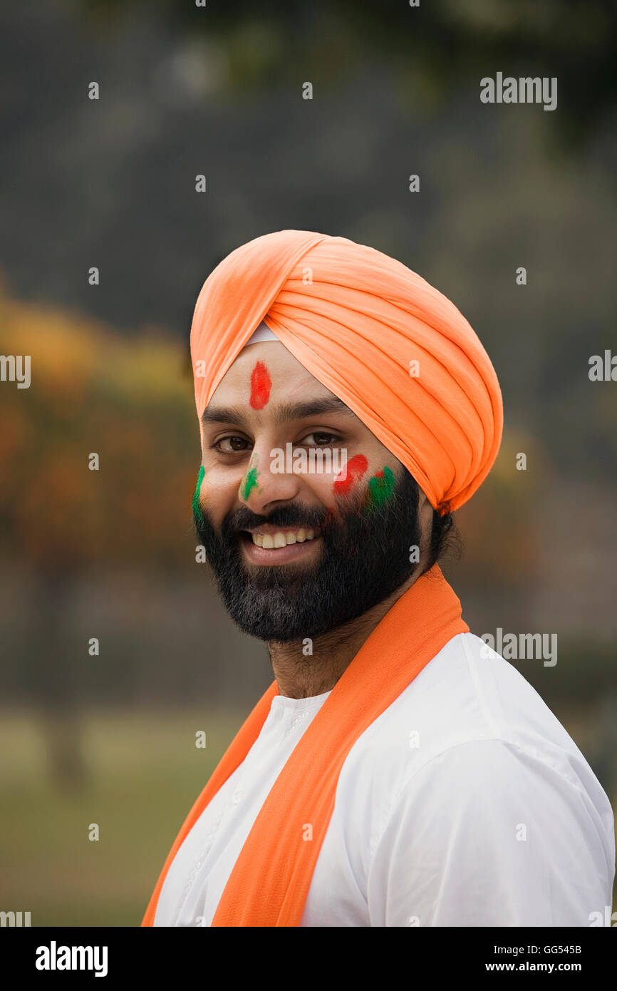 A Sikh man smiling Stock Photo - Alamy
