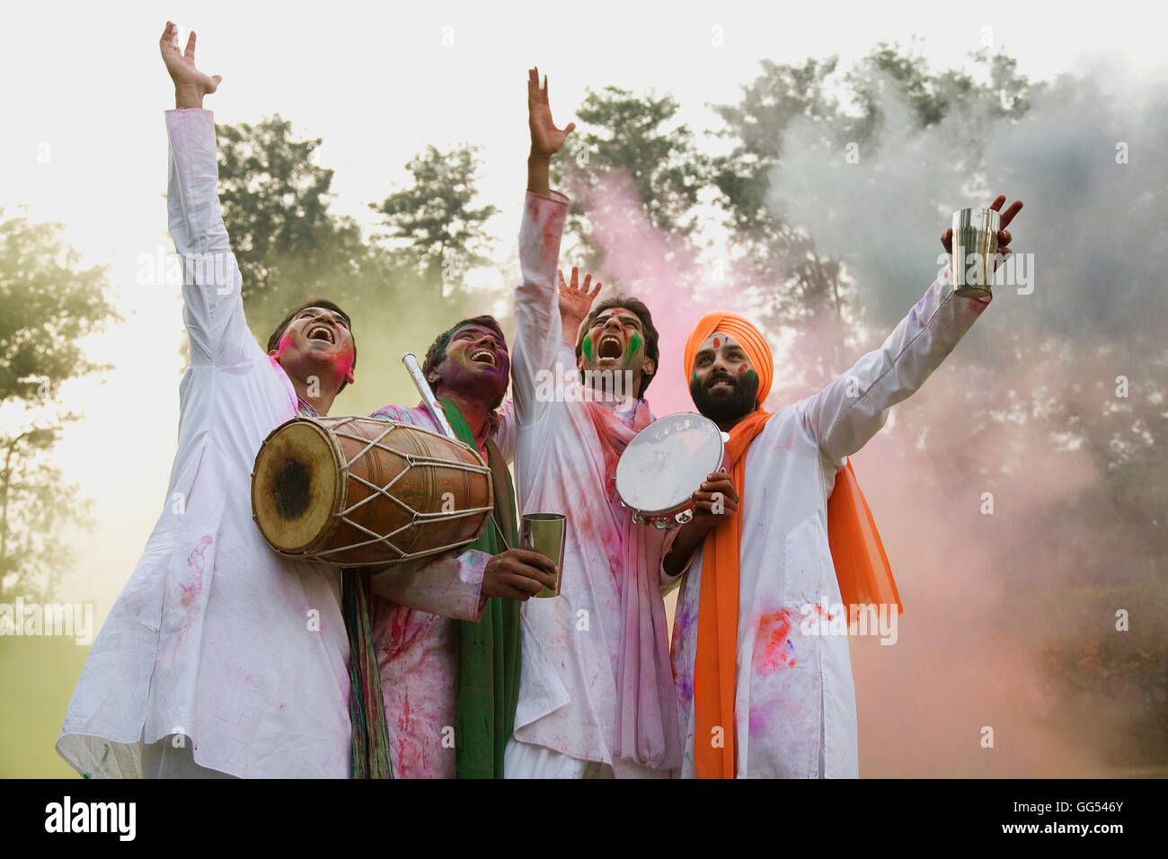 Men playing Holi Stock Photo - Alamy