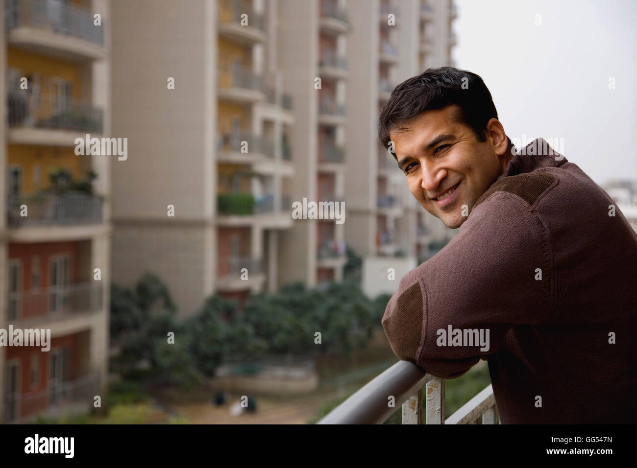 Man on a balcony hi-res stock photography and images - Alamy