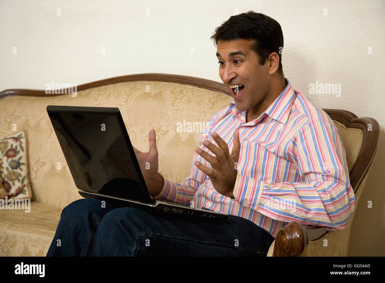 Man getting excited Stock Photo - Alamy