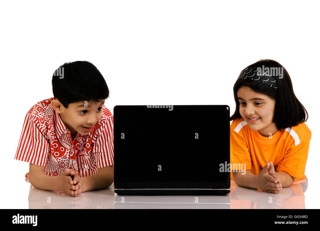Children looking at the laptop Stock Photo - Alamy