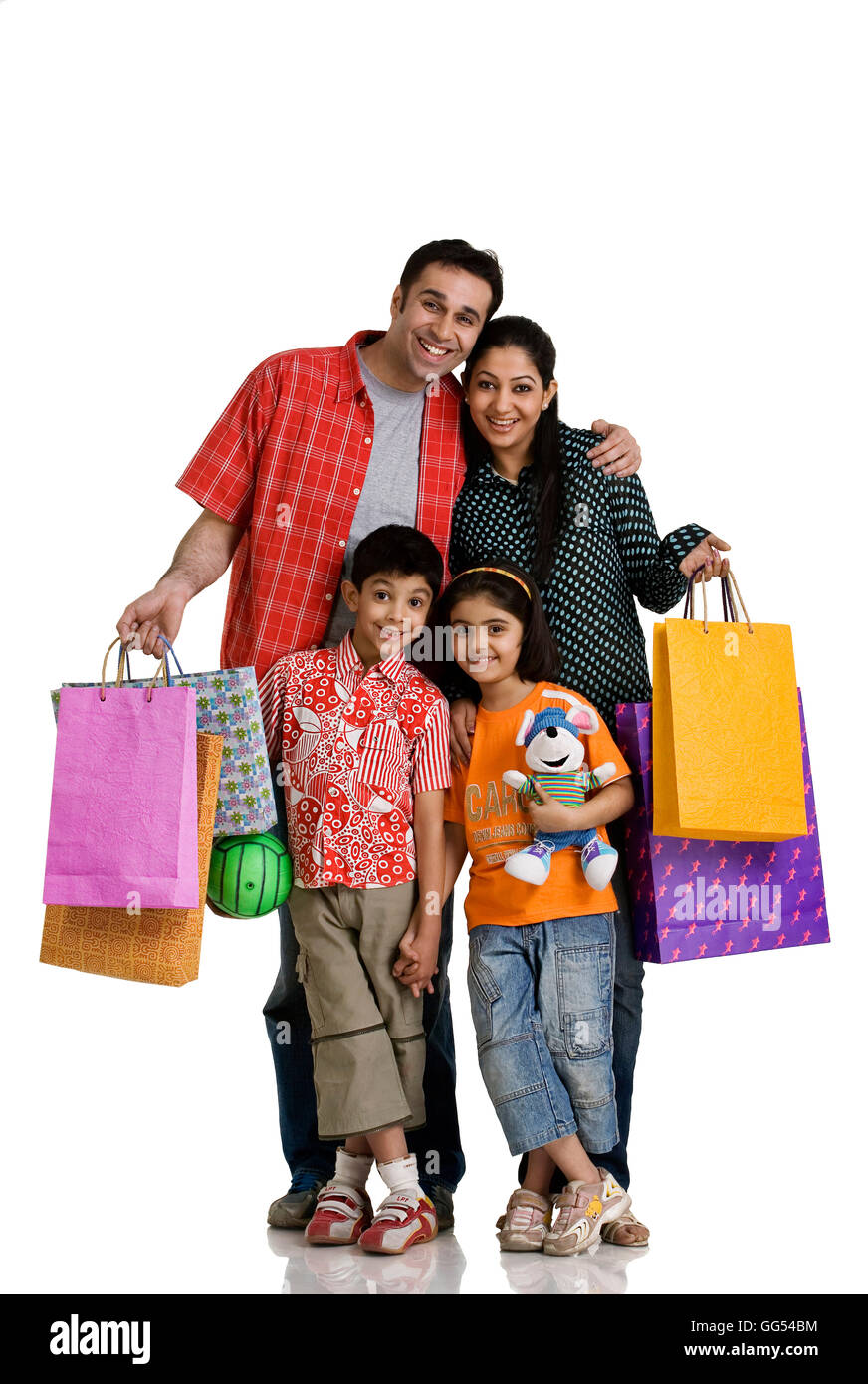 Indian family shopping bags hi-res stock photography and images - Alamy