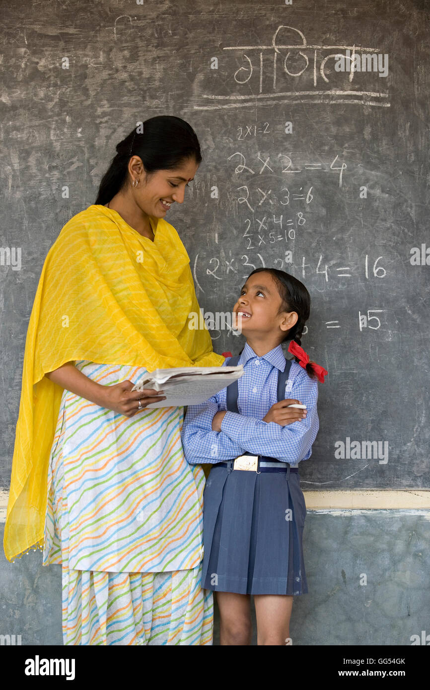 Rural student and teacher Stock Photo - Alamy
