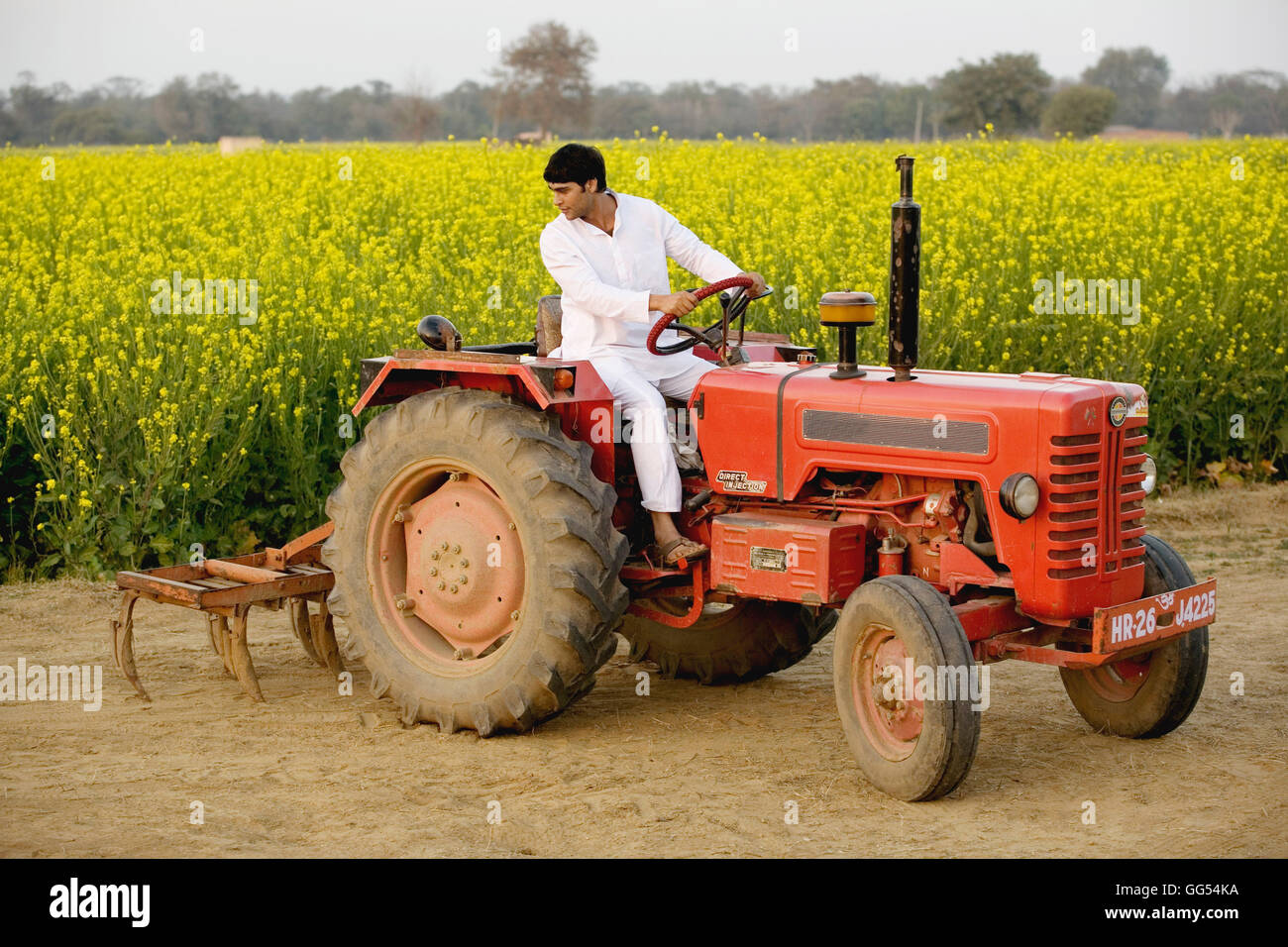Farmer on a tractor hi-res stock photography and images - Alamy