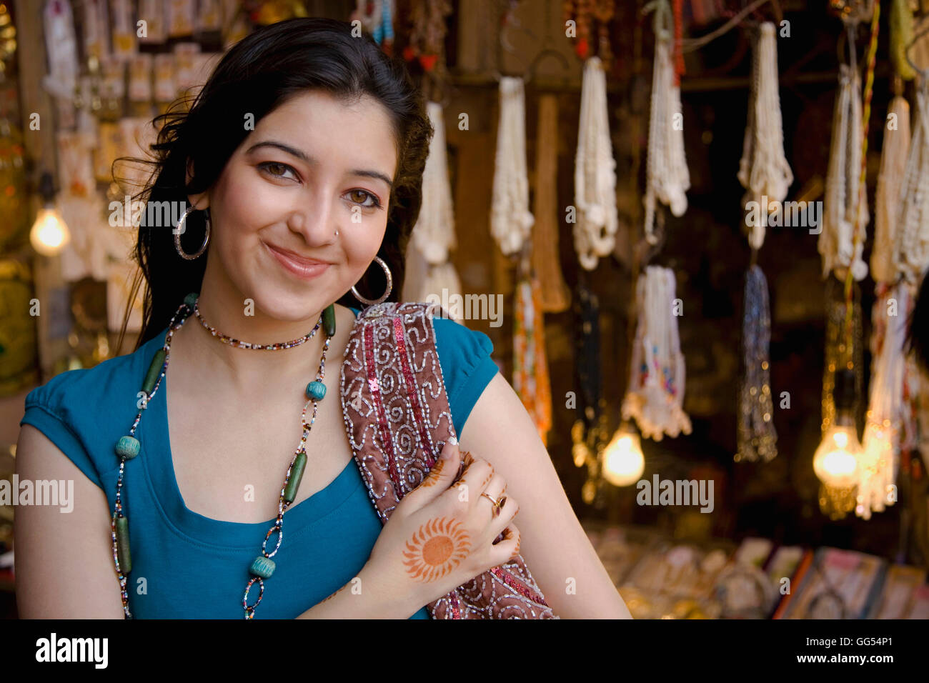 Girl in front of a shop Stock Photo - Alamy