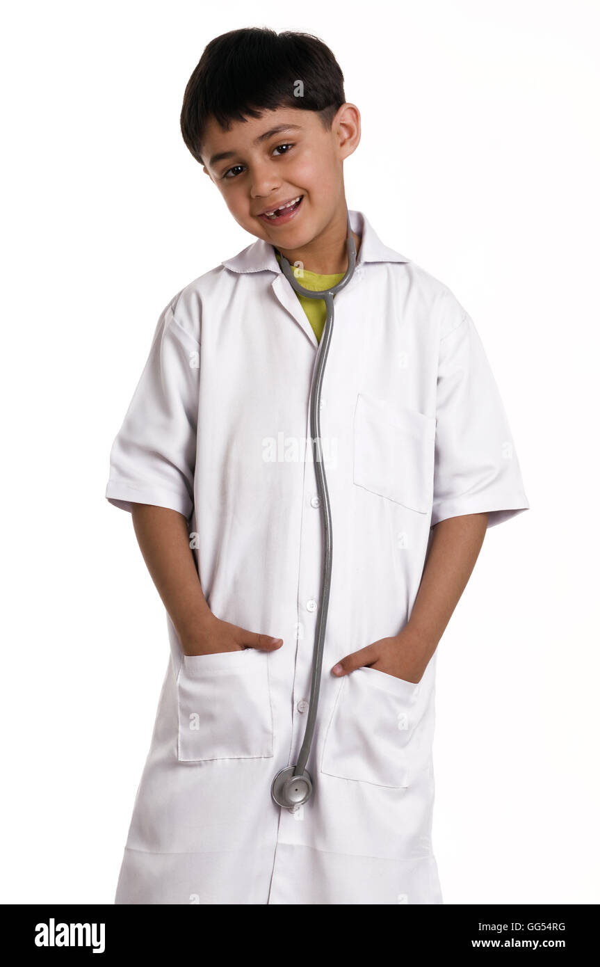 A boy wearing a doctor's coat Stock Photo - Alamy
