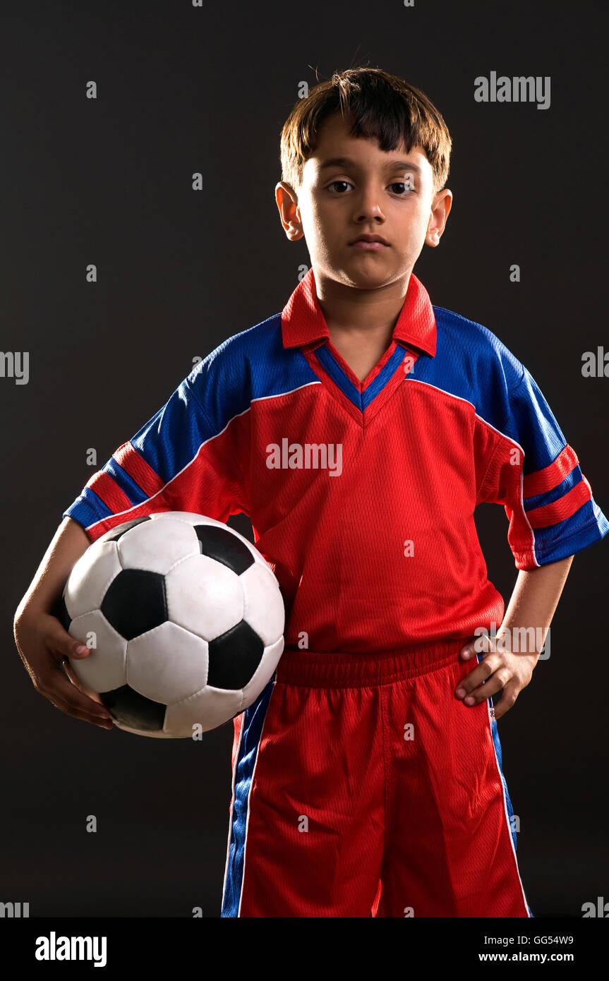 Holding footballs hi-res stock photography and images - Alamy