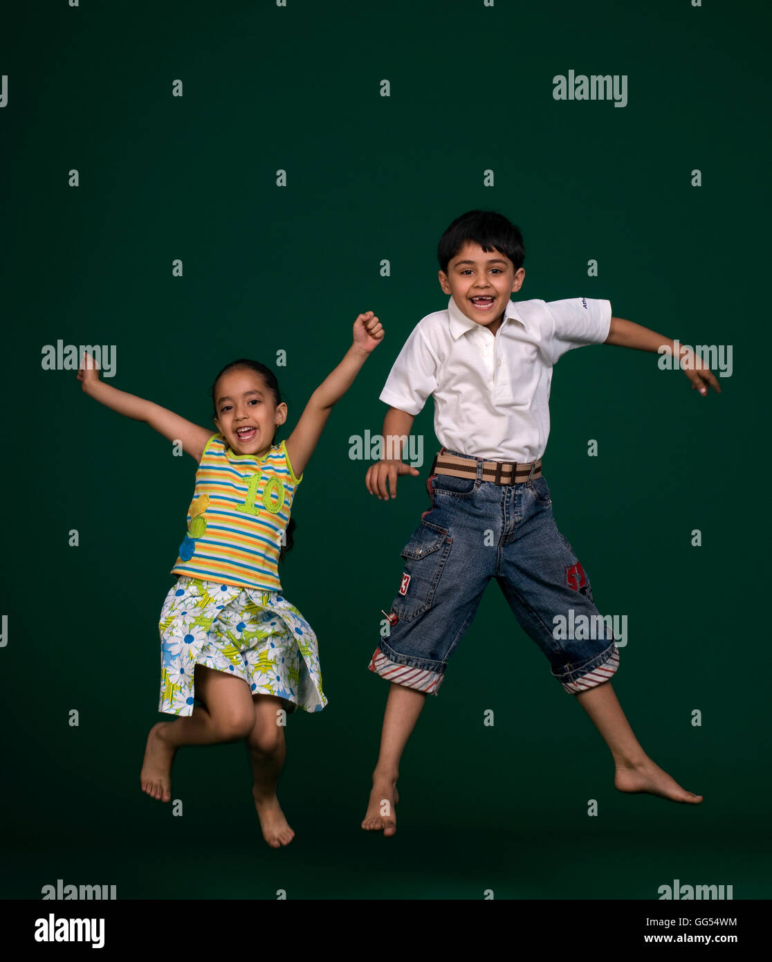Children jumping for joy hi-res stock photography and images - Alamy
