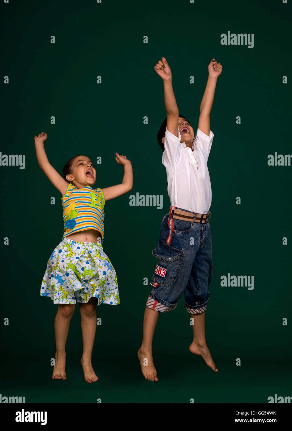 Children jumping for joy hi-res stock photography and images - Alamy