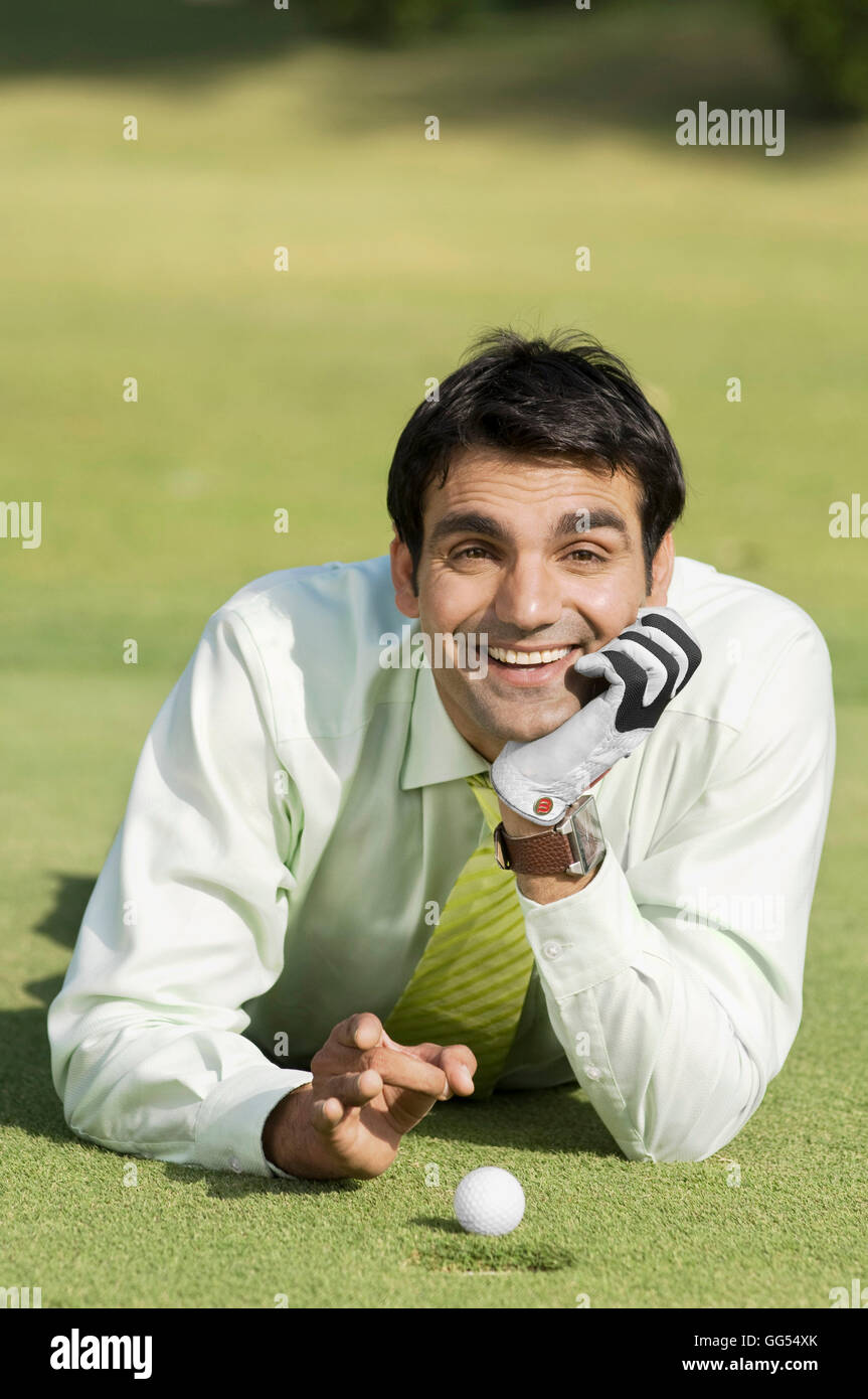 Golfer lying down hi-res stock photography and images - Alamy
