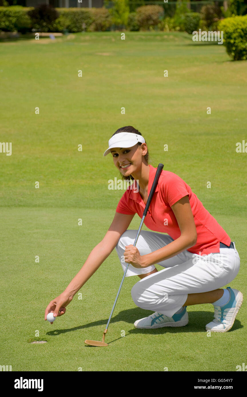 Asian woman playing golf hi-res stock photography and images - Alamy