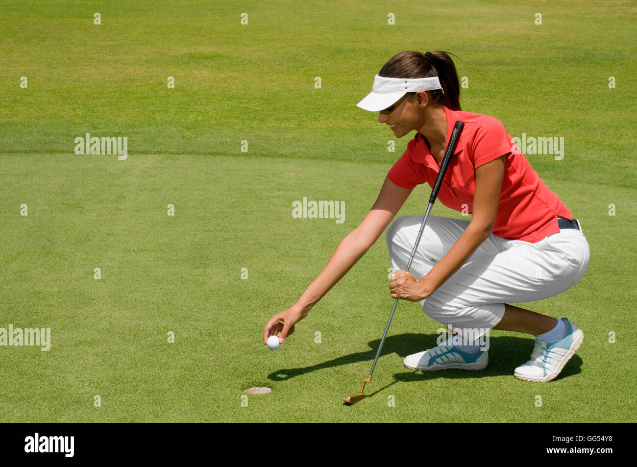 Asian woman playing golf hi-res stock photography and images - Alamy