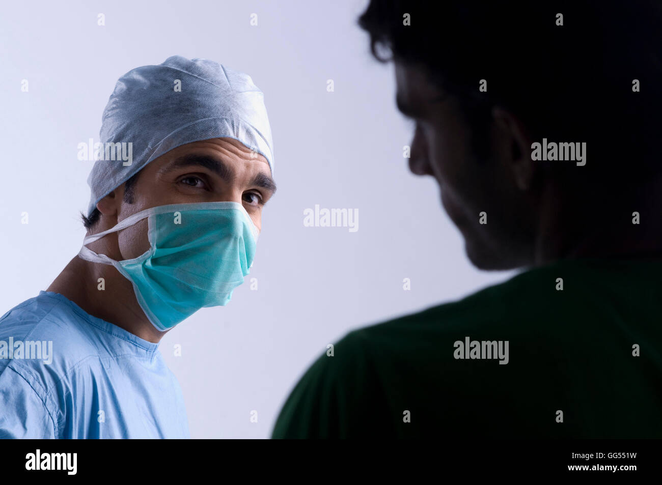 Surgeon talking to a patient Stock Photo - Alamy