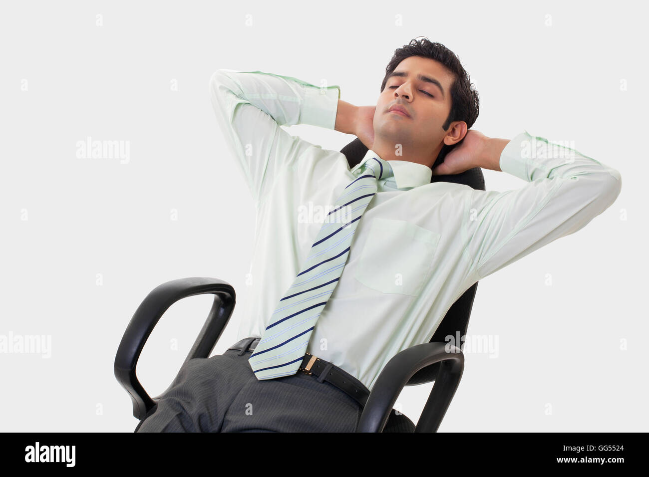 Young indian man relaxing on chair hi-res stock photography and images ...