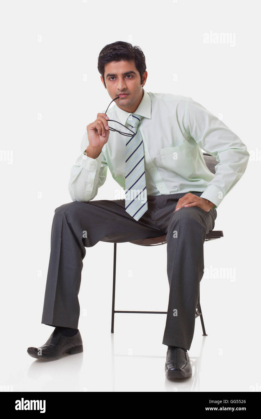 Man sitting on chair full hi-res stock photography and images - Alamy