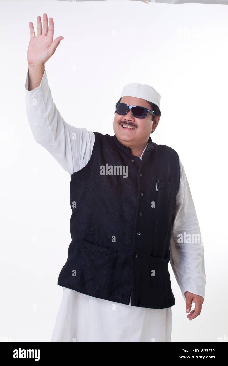 Happy politician waving hand Stock Photo - Alamy