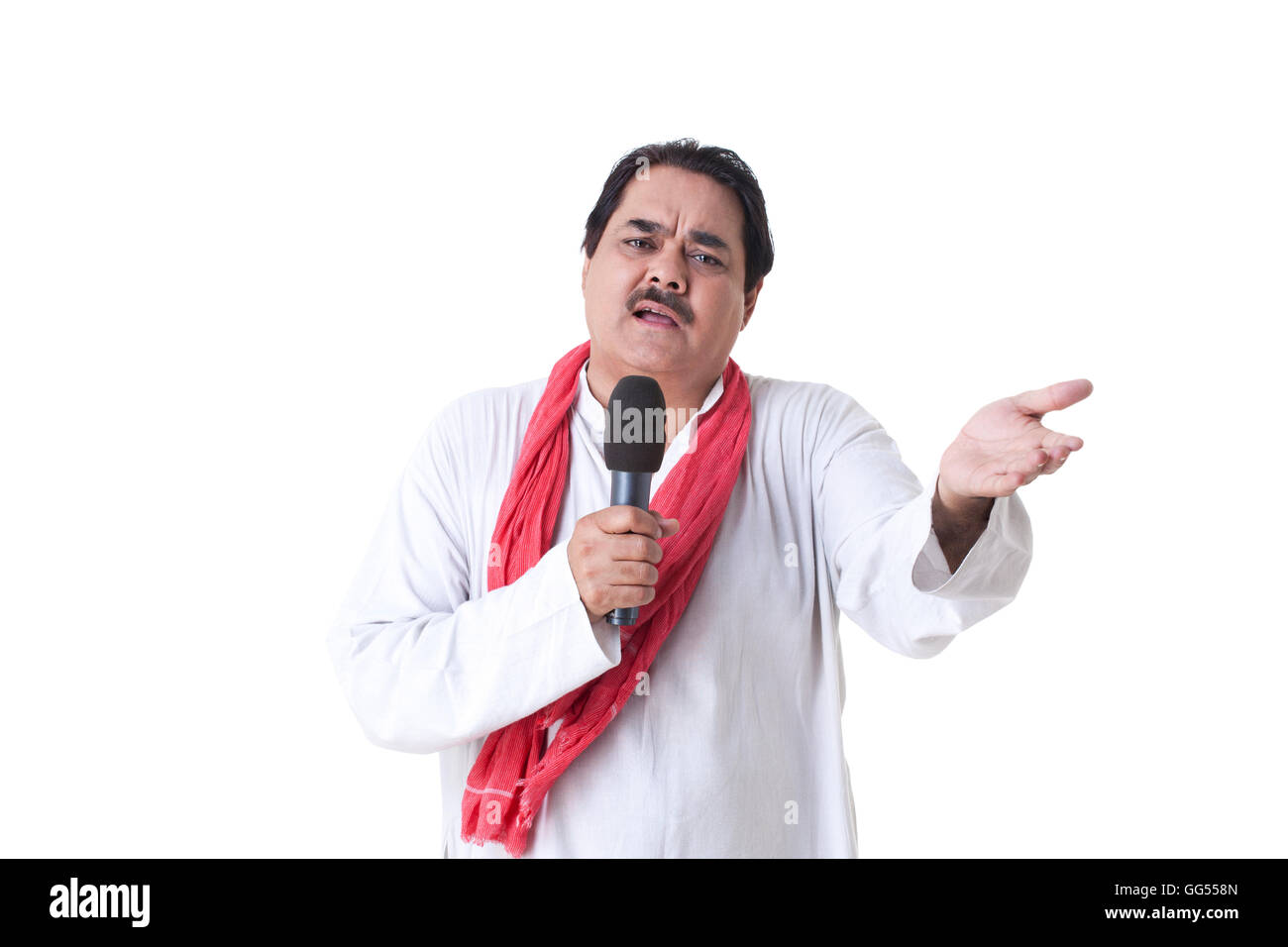 Male politician with microphone Stock Photo - Alamy