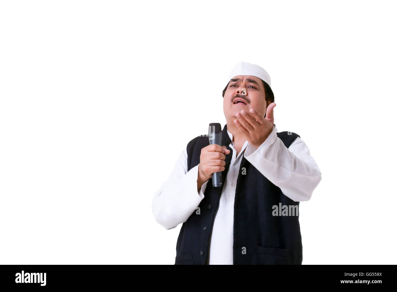 Male politician with microphone speaking Stock Photo - Alamy