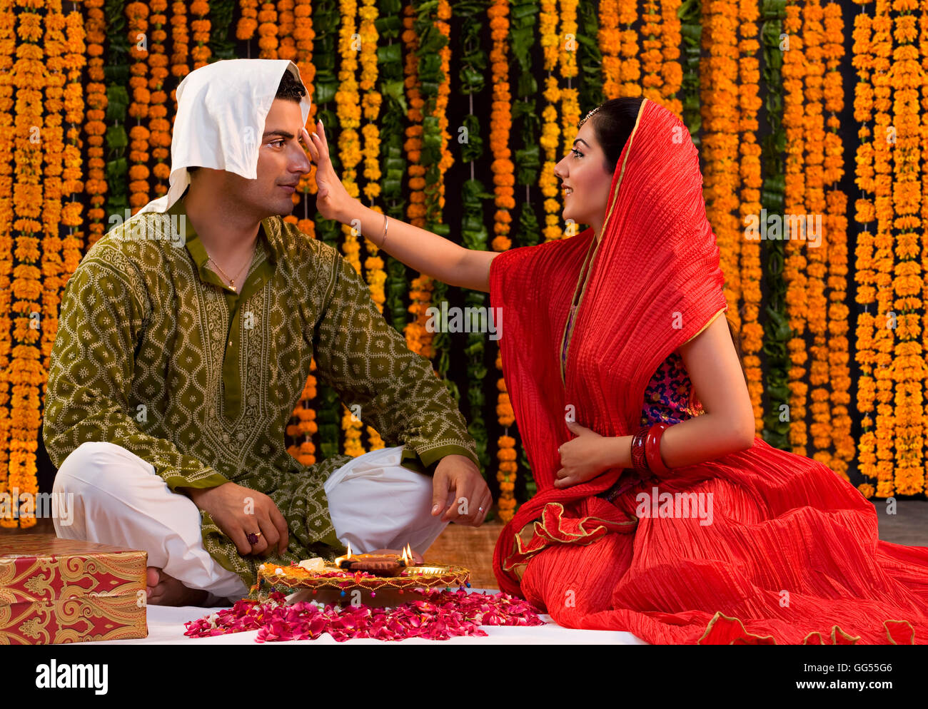 Applying a tika Stock Photo - Alamy