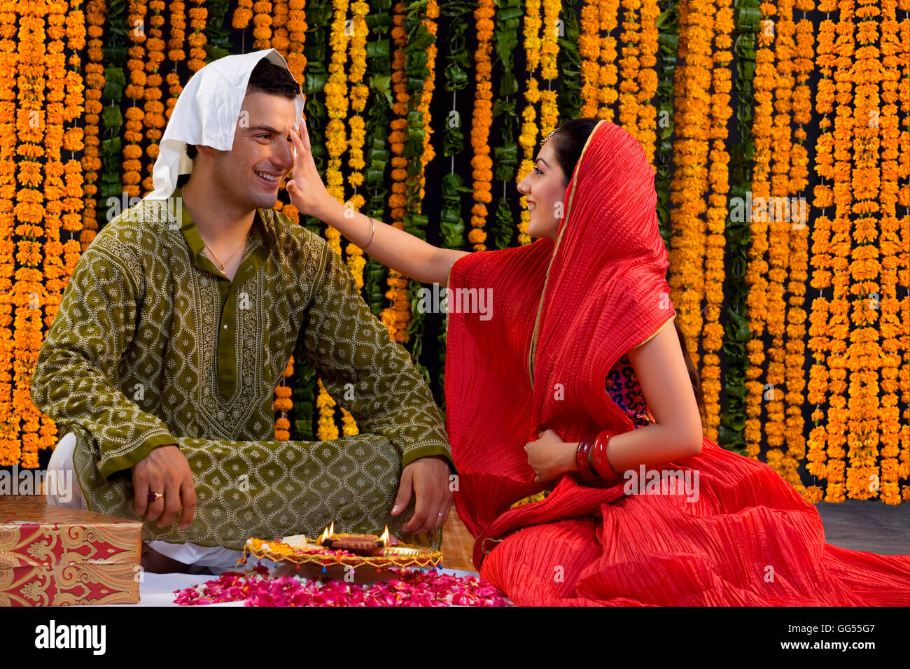 Applying a tika Stock Photo - Alamy