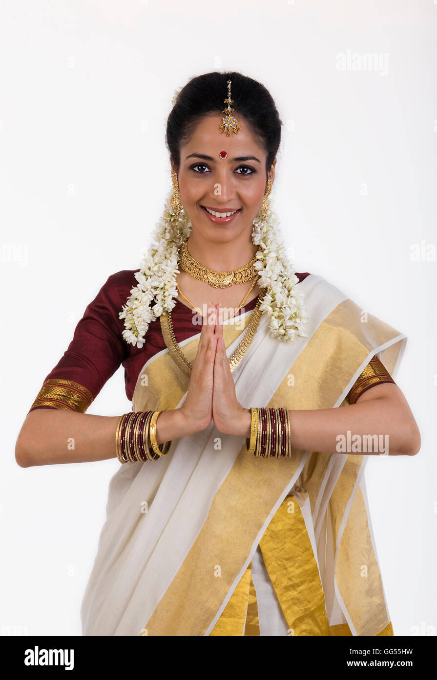 South indian woman greeting folded hi-res stock photography and images ...