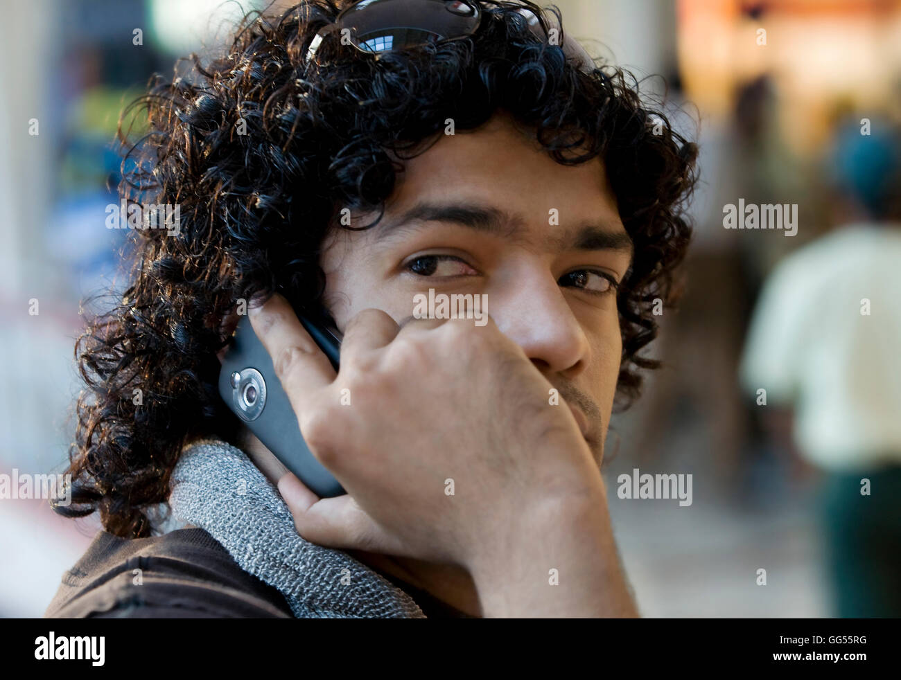 Man talking on his mobile phone Stock Photo - Alamy