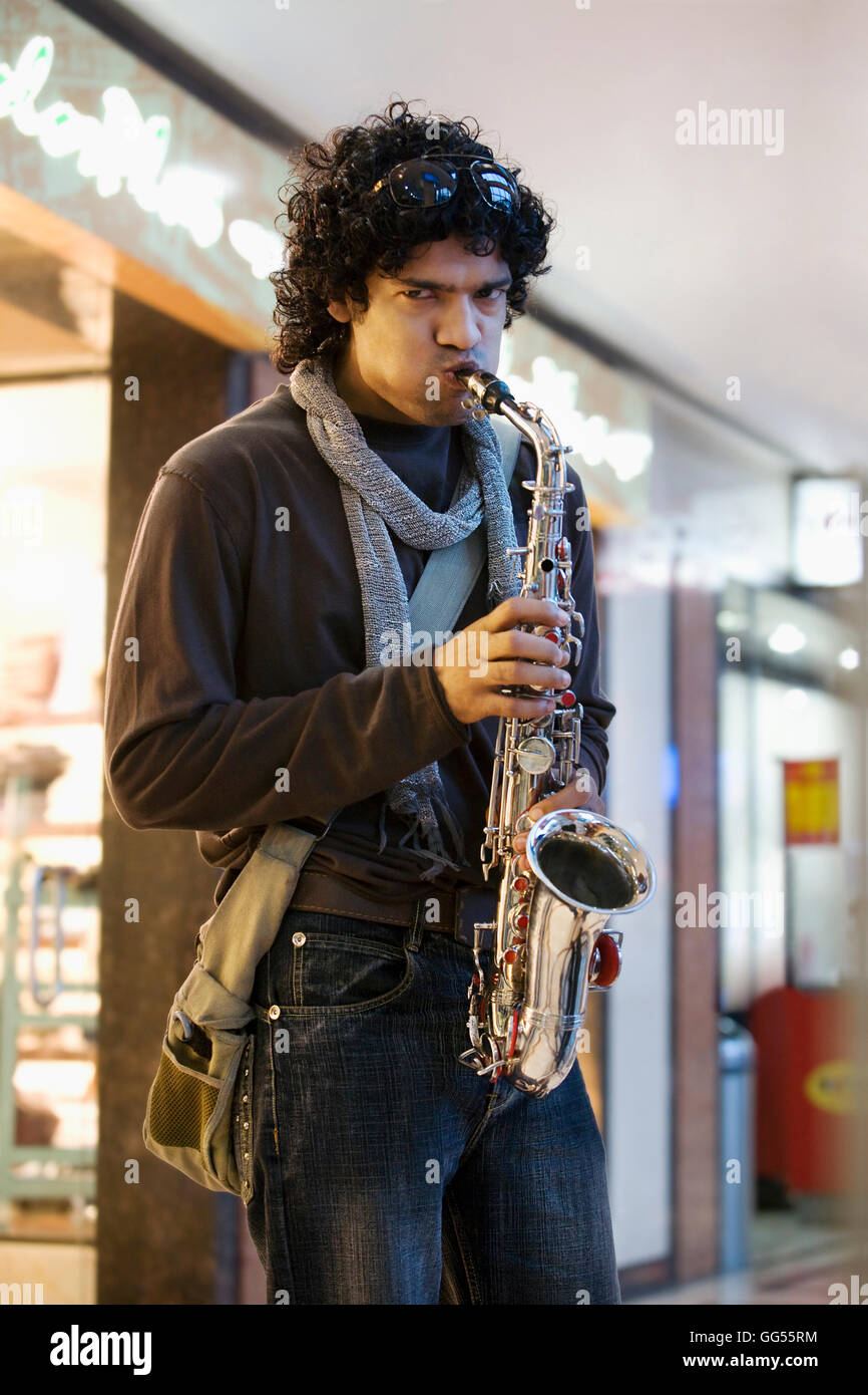 Saxophone playing man hi-res stock photography and images - Alamy