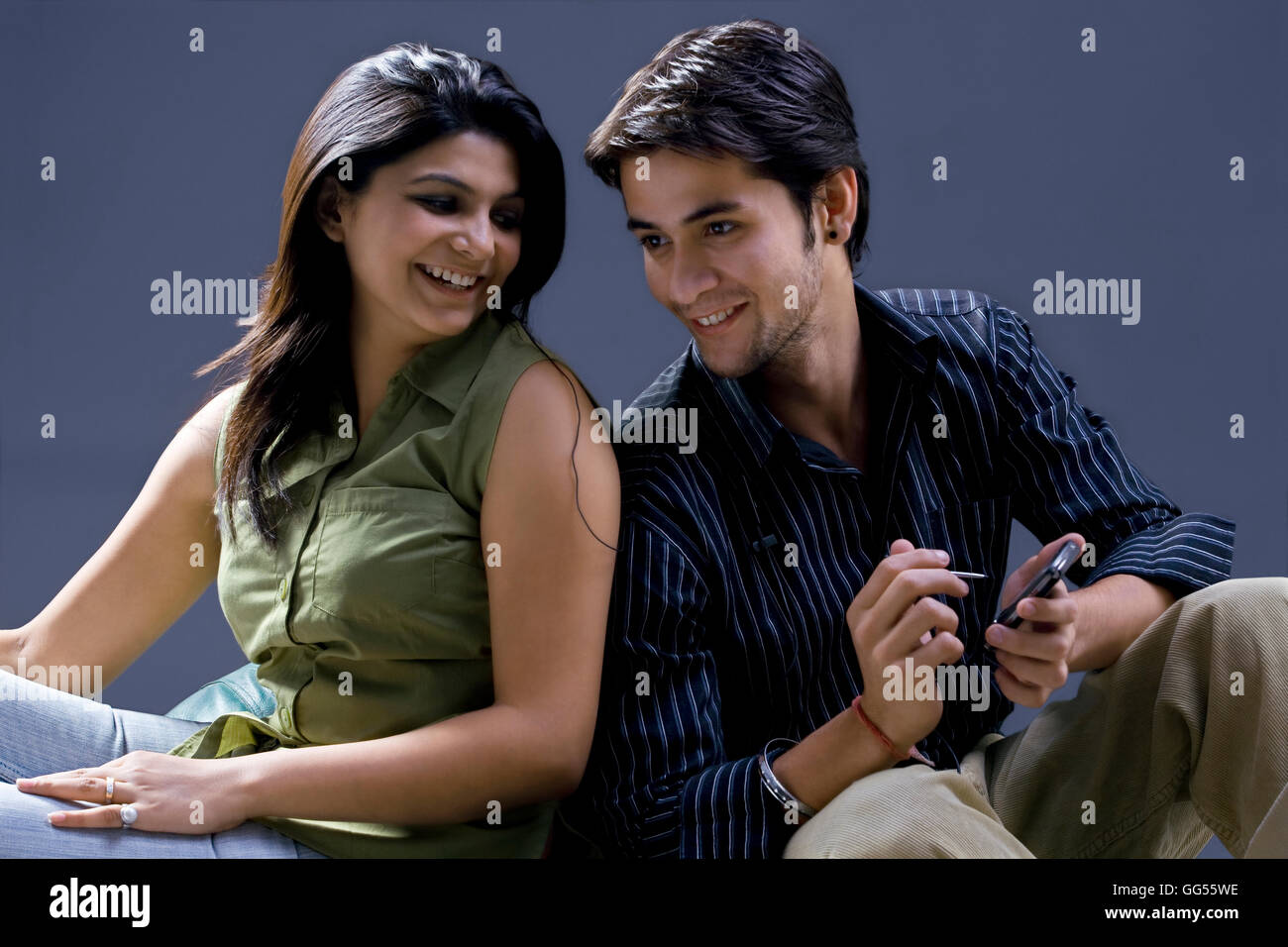 Friends with a mobile phone Stock Photo - Alamy