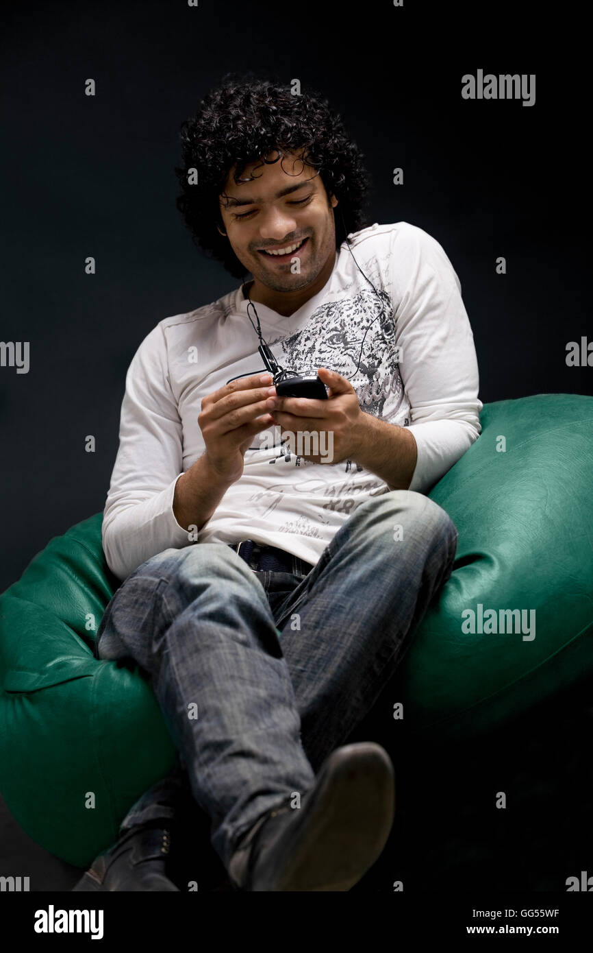 Man with his mobile phone Stock Photo - Alamy