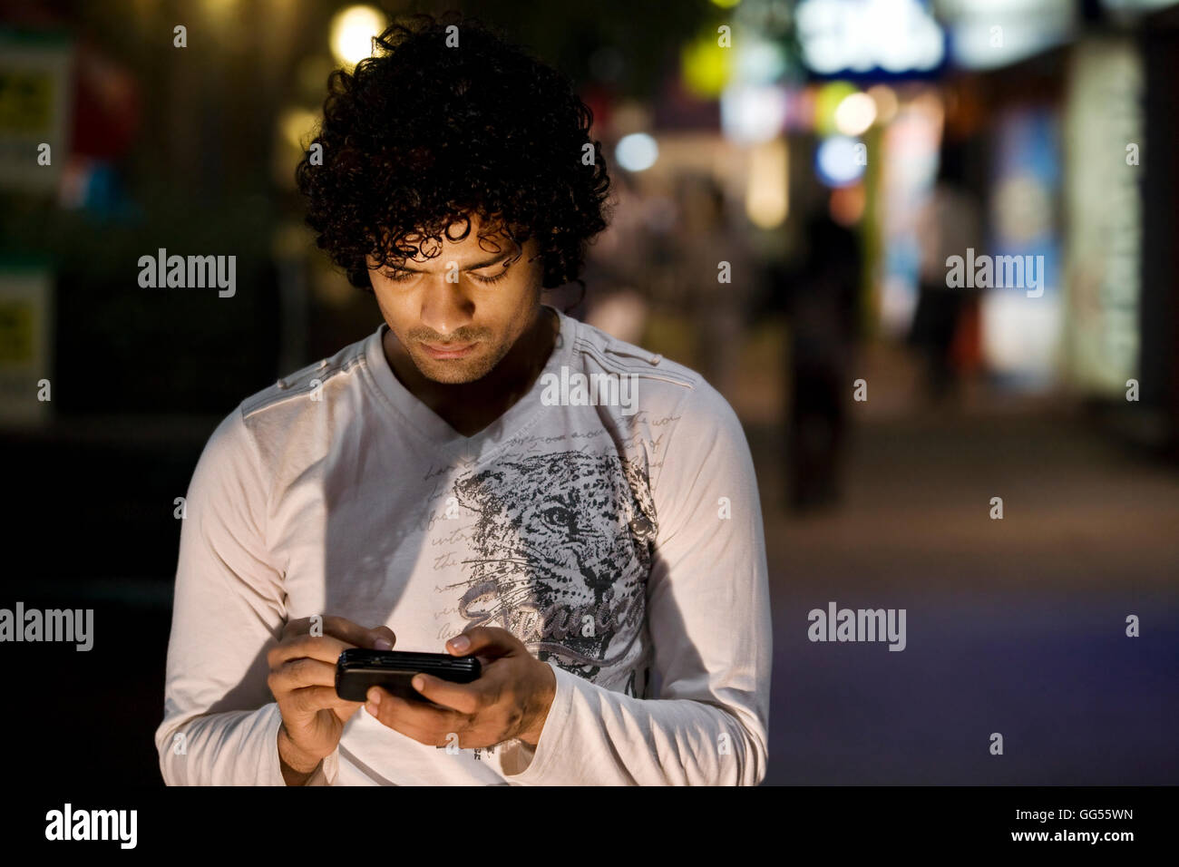 Man with a mobile phone Stock Photo - Alamy