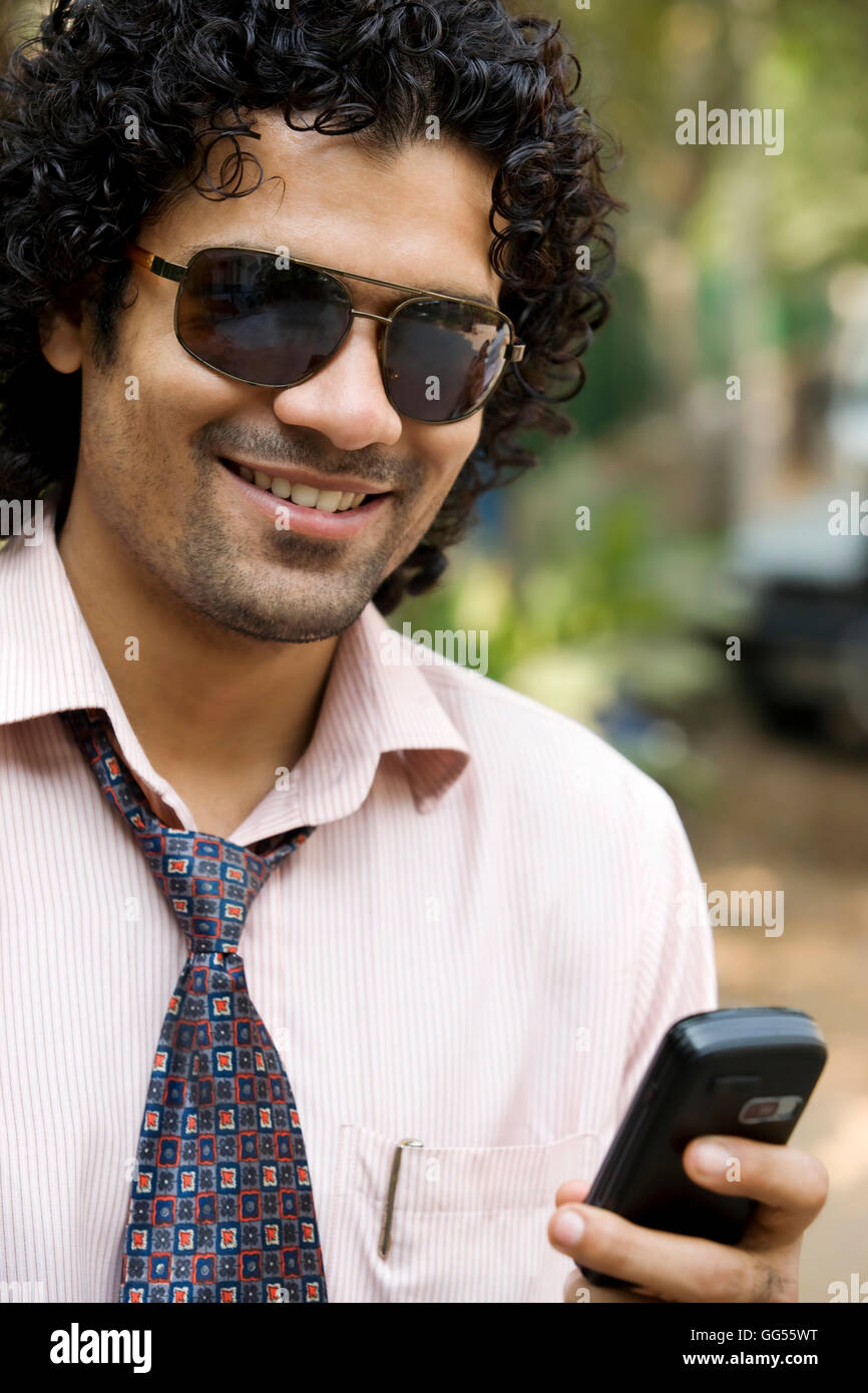 Man with a mobile phone Stock Photo - Alamy