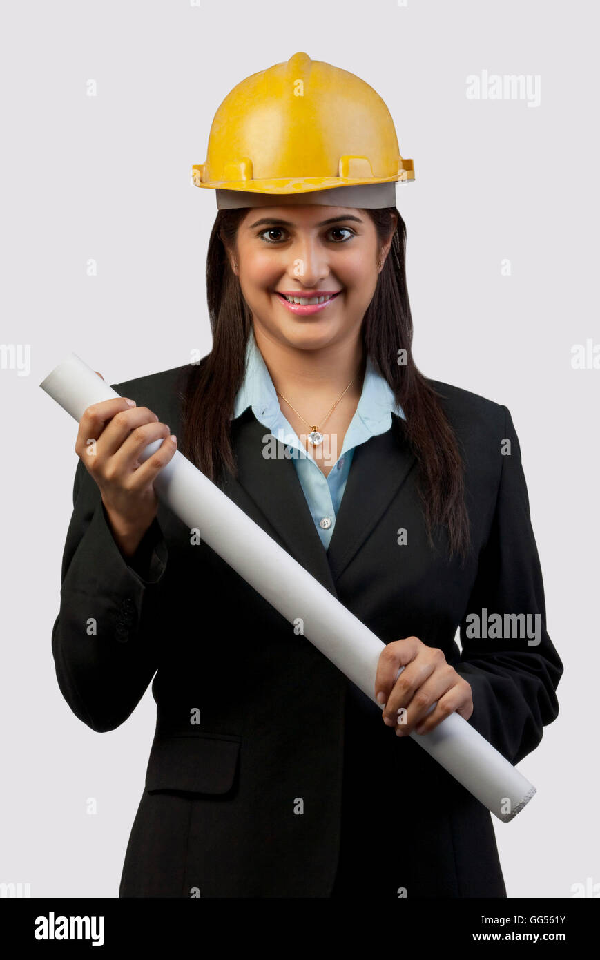 A female engineer with blueprints Stock Photo - Alamy