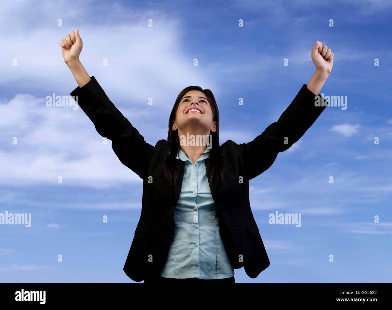Woman feeling victorious Stock Photo - Alamy