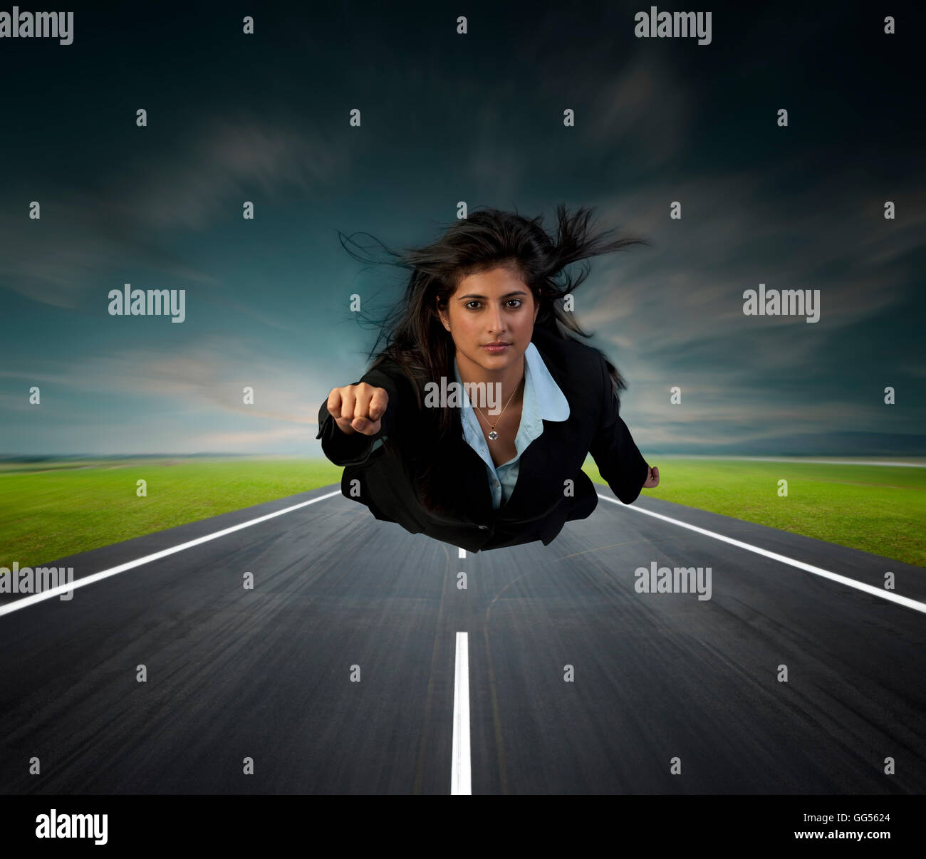 Businesswoman flying through the sky Stock Photo - Alamy