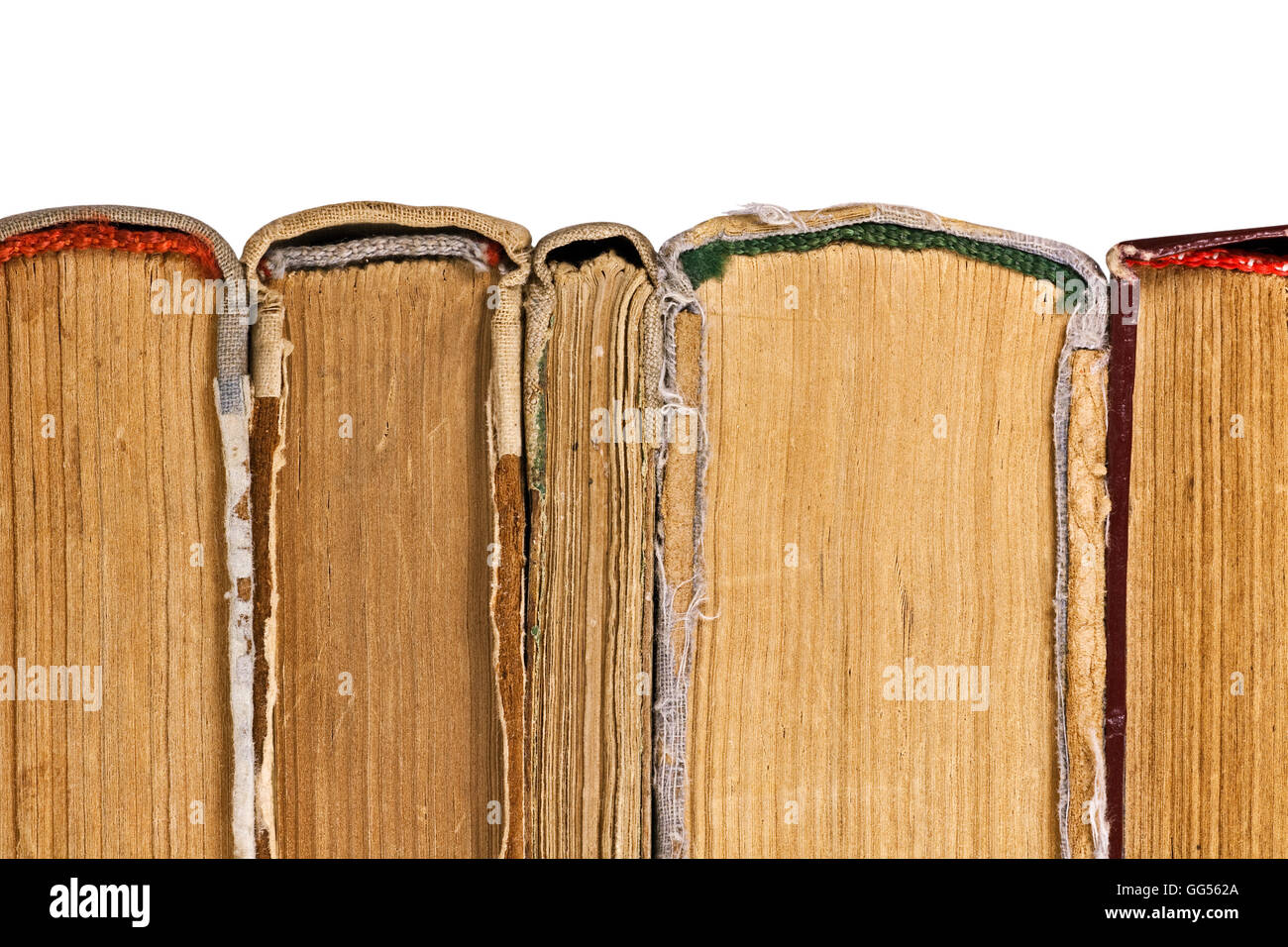 Row of antique books with the torn covers Stock Photo - Alamy