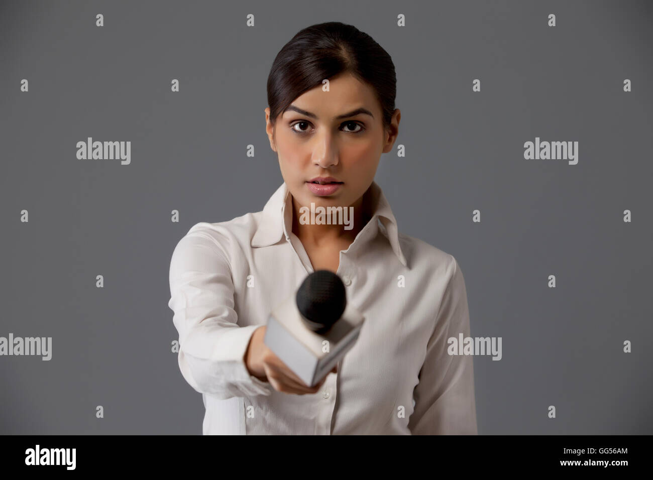 Microphone close up woman serious hi-res stock photography and images - Alamy