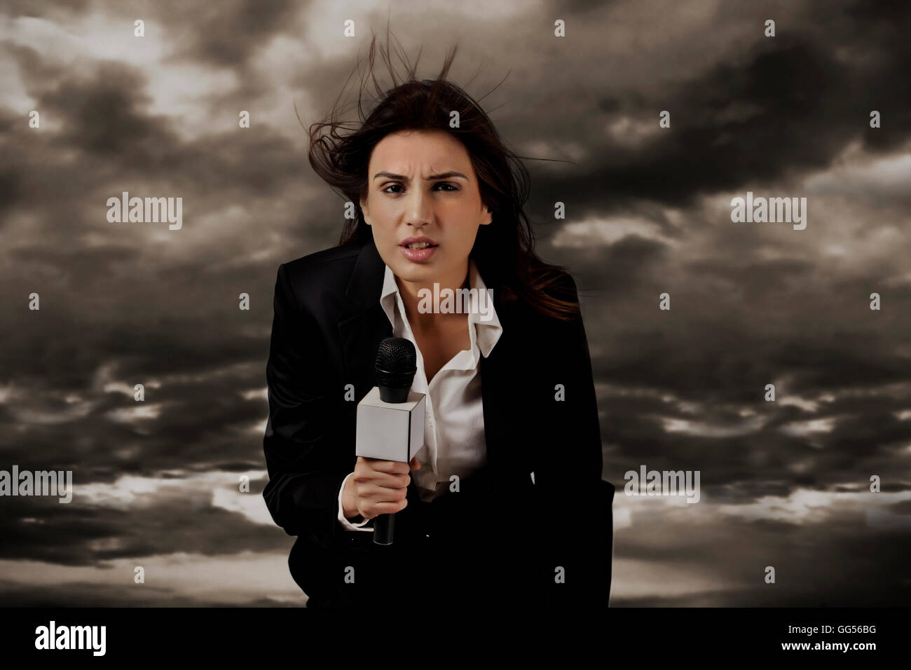News presenter in storm Stock Photo - Alamy