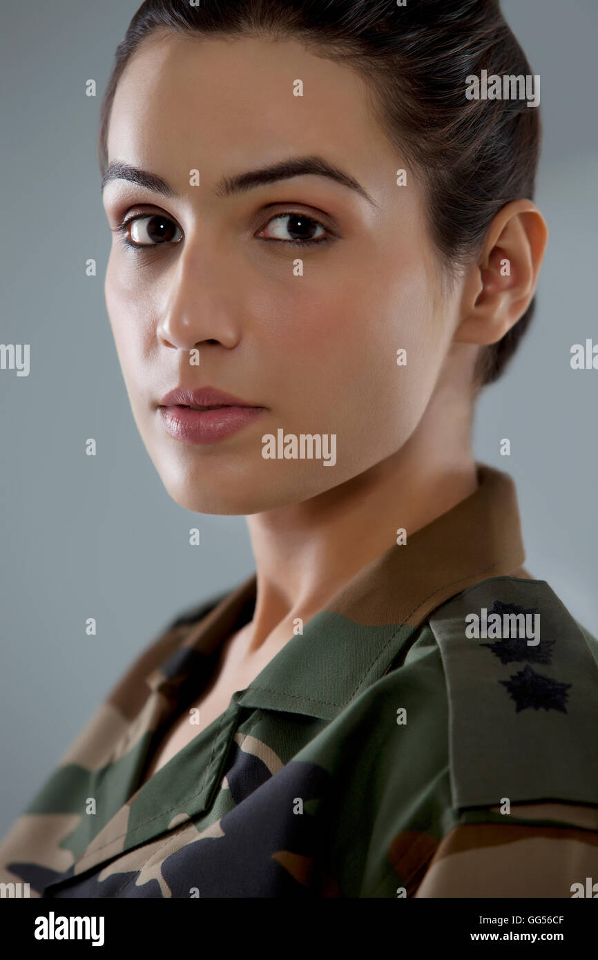 Close-up of beautiful young female soldier Stock Photo - Alamy