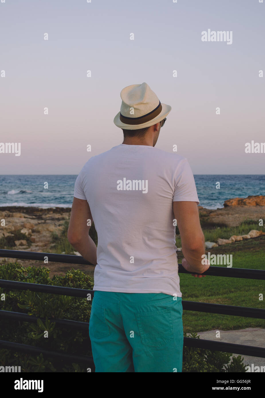 Pensive man thinking looking forward at sunset Stock Photo - Alamy