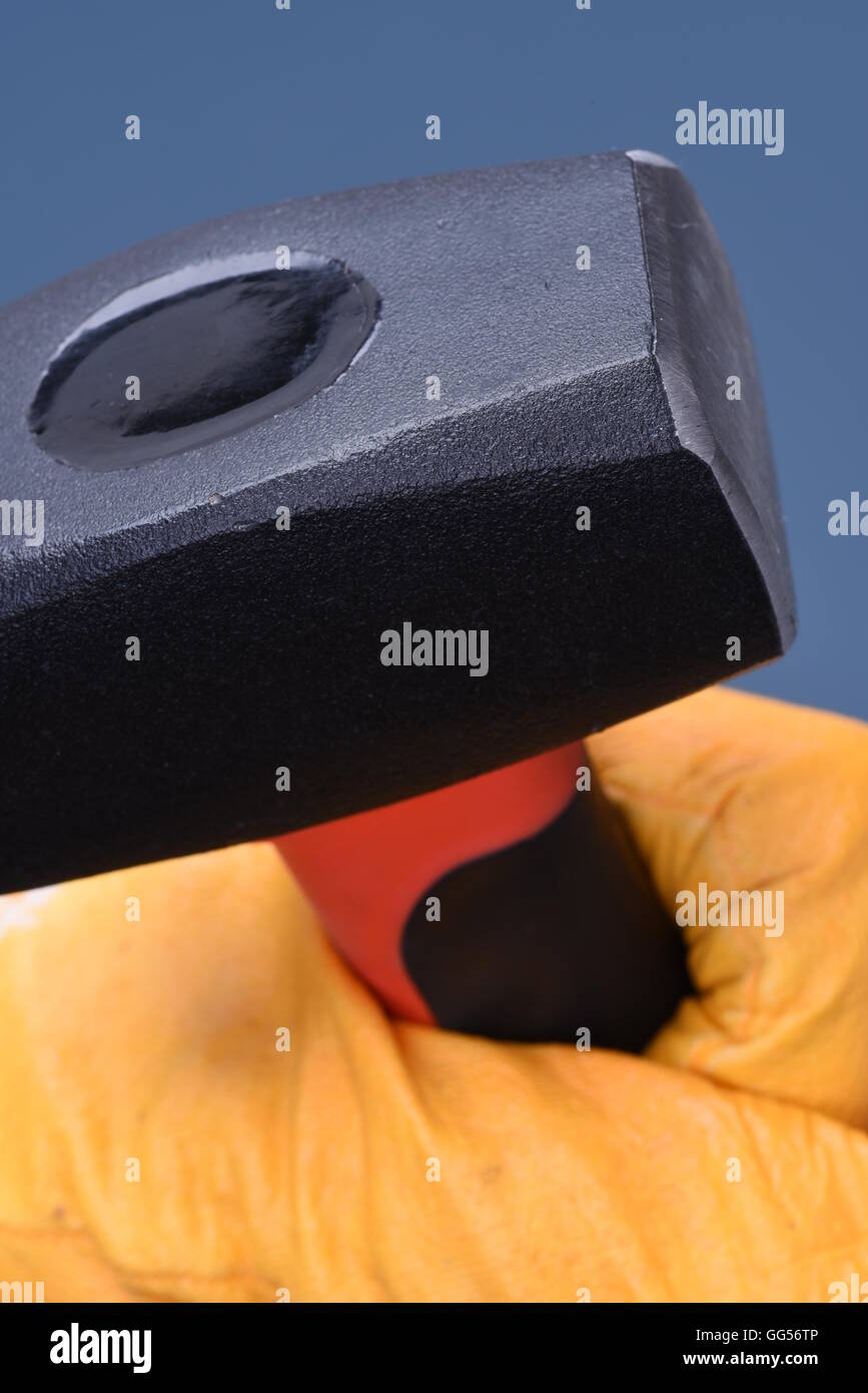 Hand holding hammer hi-res stock photography and images - Alamy