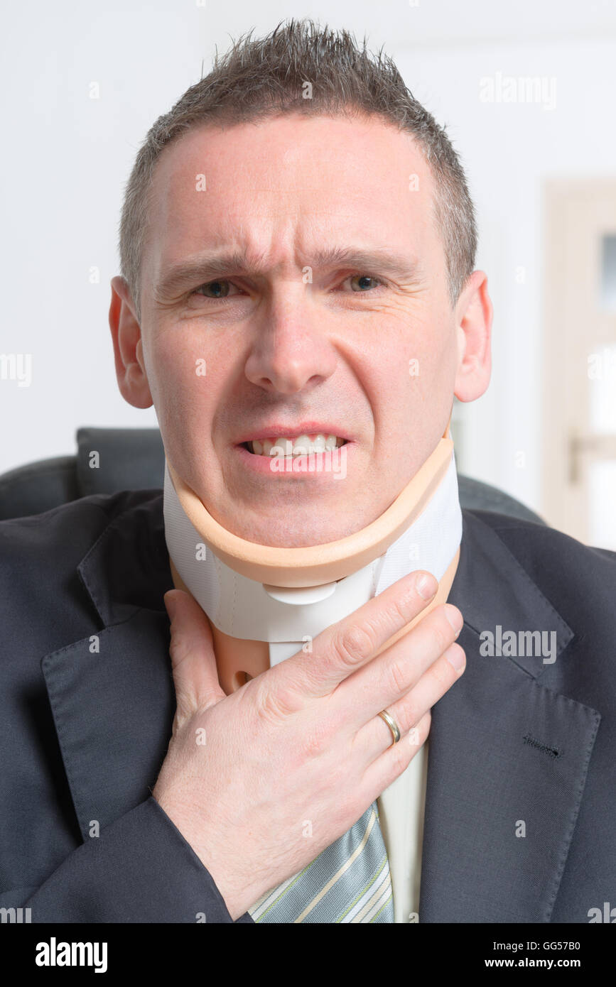 Man surgical cervical collar suffering hi-res stock photography and ...