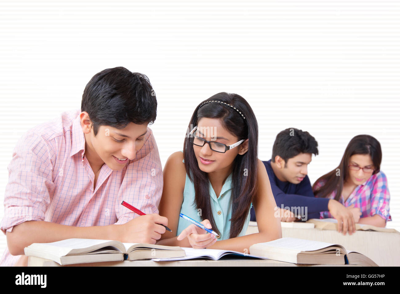 Young university students studying in classroom Stock Photo - Alamy
