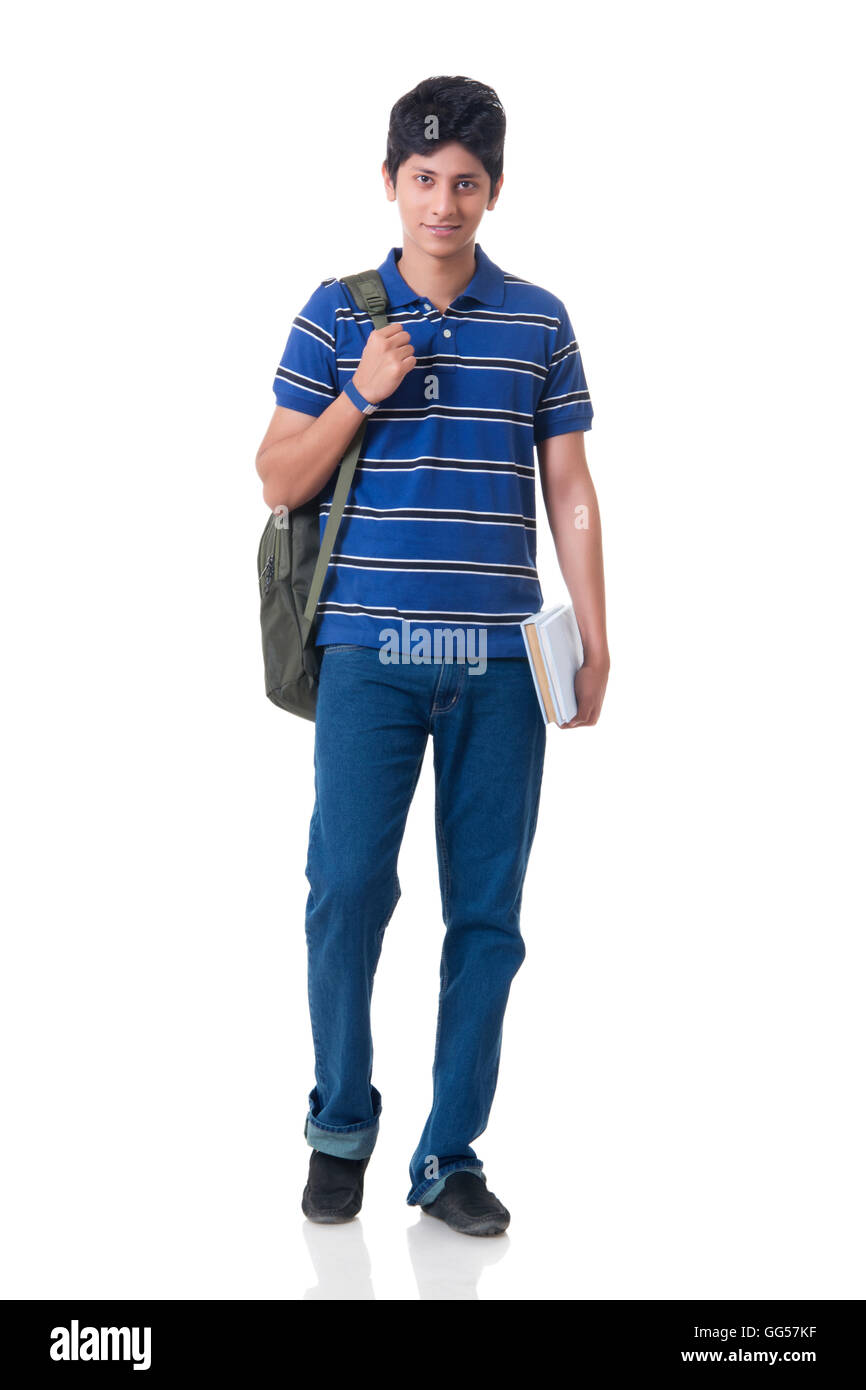 Full length portrait of confident male student with books and rucksack ...