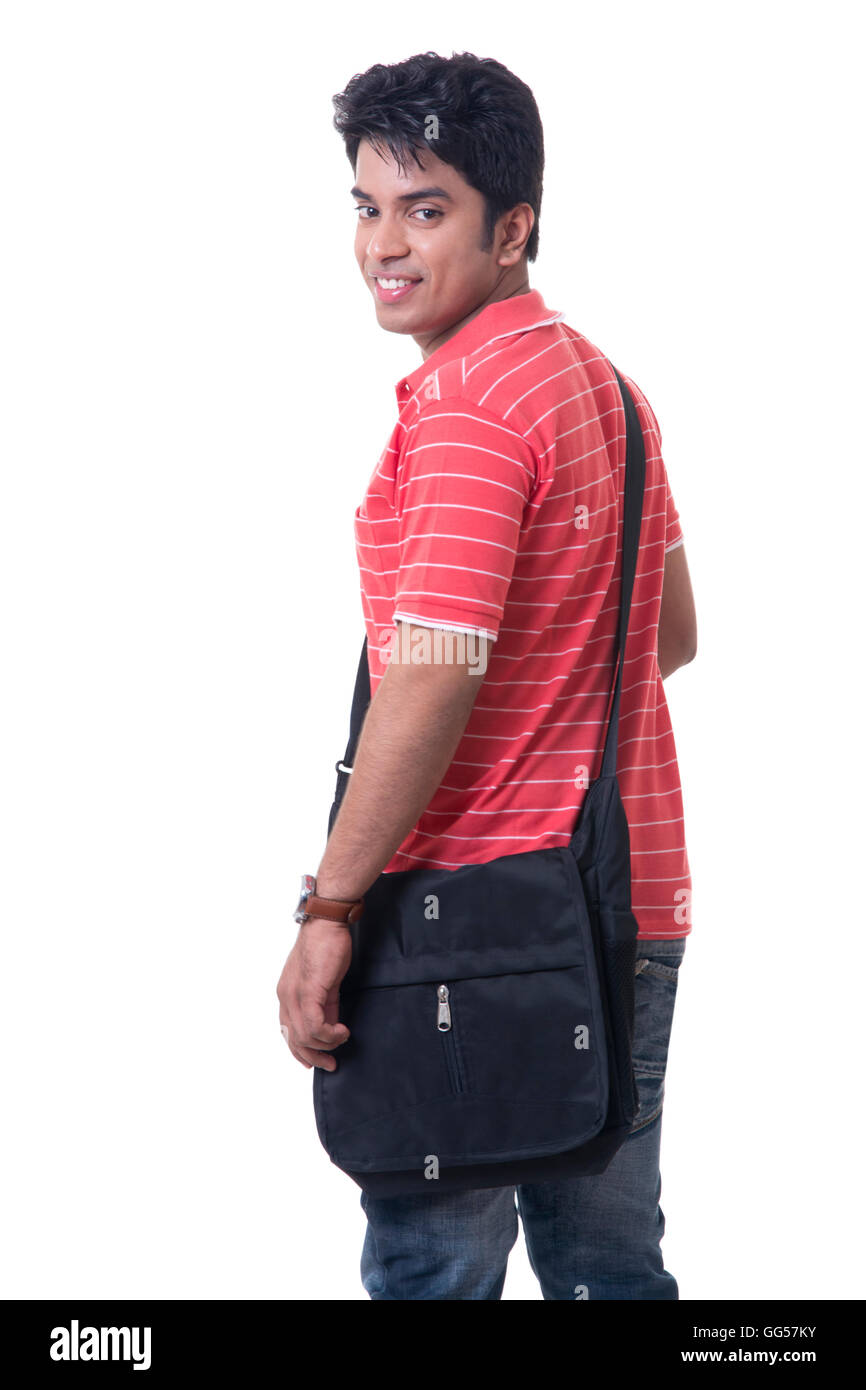 Portrait of happy male student with bag against white background Stock ...