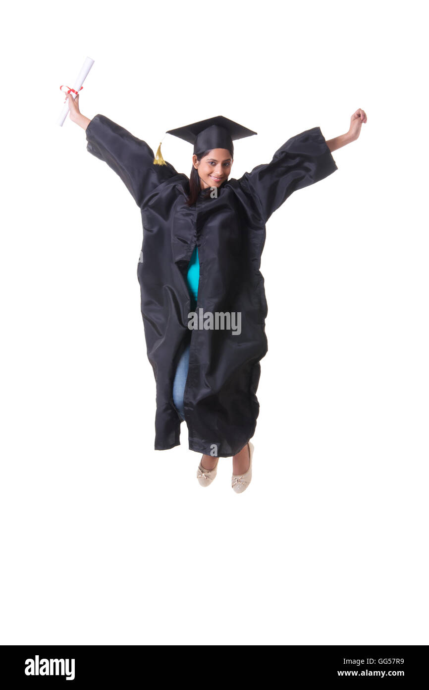 Full length portrait of excited graduate student jumping over white ...