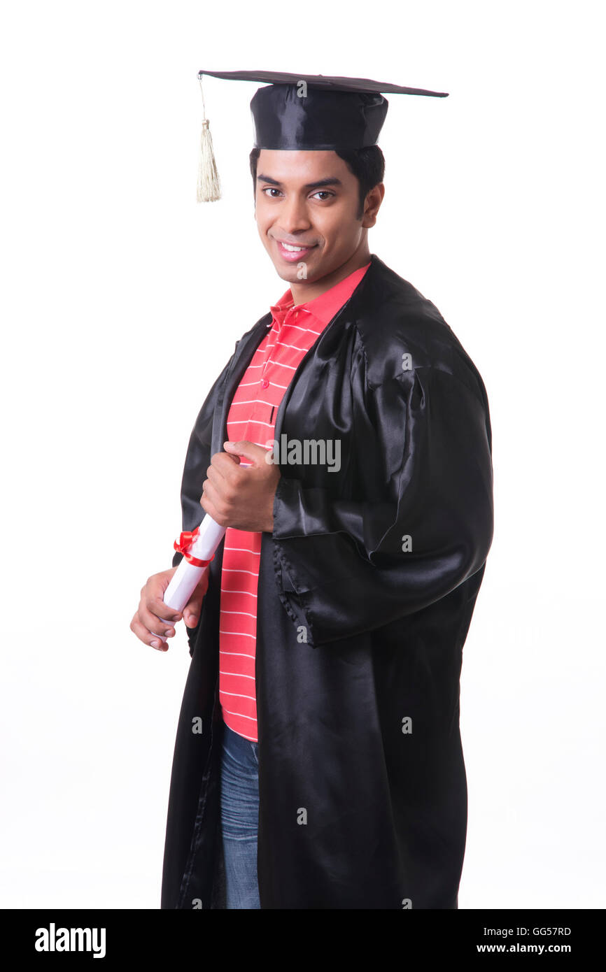 Portrait of smiling male graduate student against white background ...