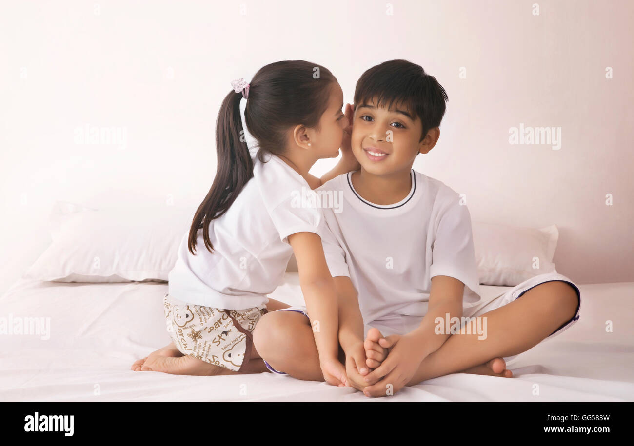 Whispering in ear hi-res stock photography and images - Alamy