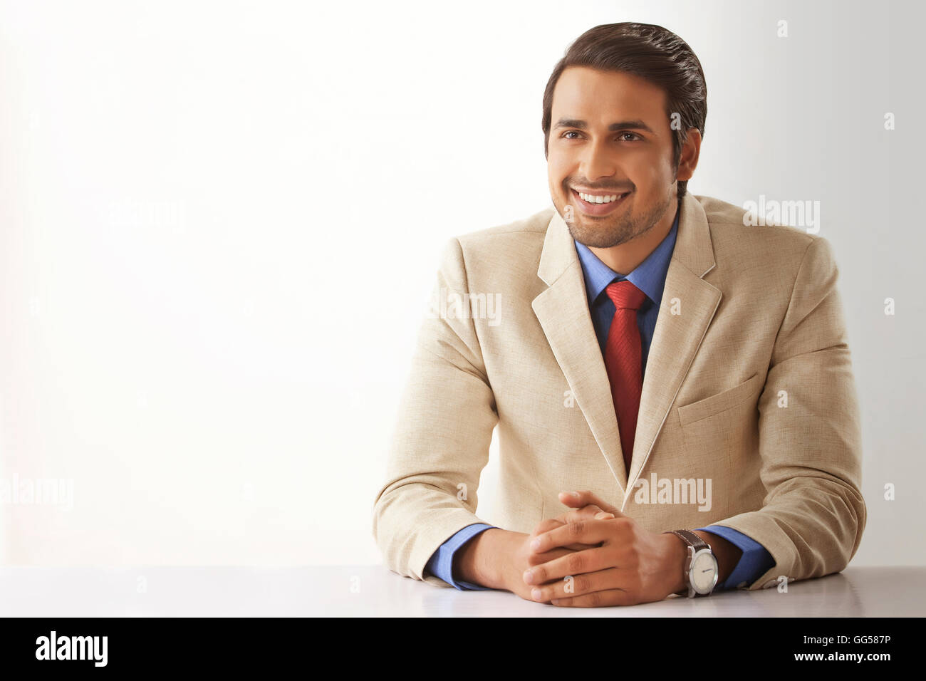 Young businessman sitting office hi-res stock photography and images ...